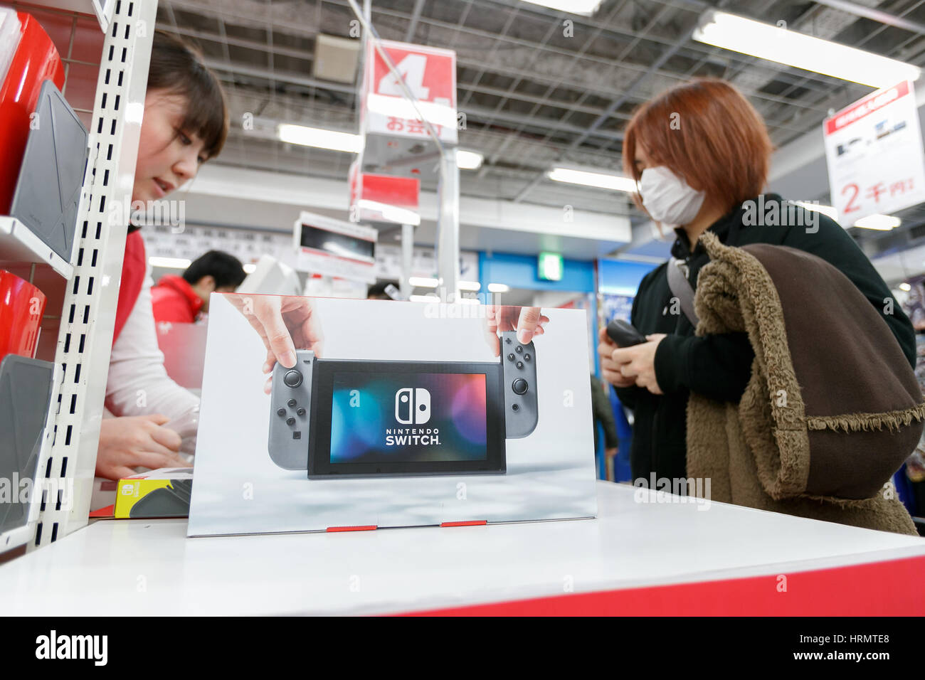 Tokyo, Japan. 3rd March, 2017. A Japanese gamer buys the new Nintendo ...