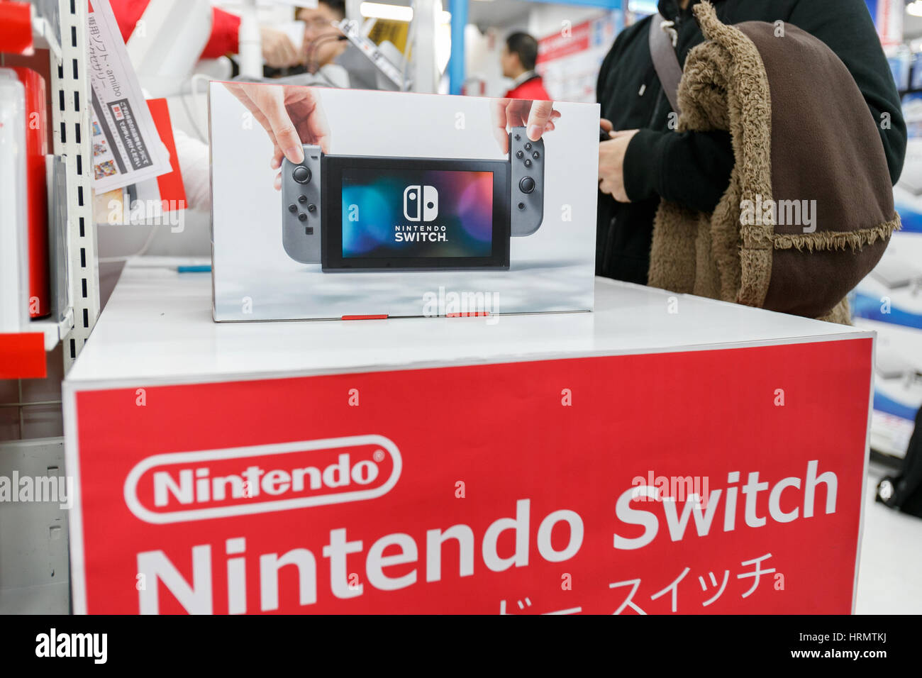 Tokyo, Japan. 3rd March, 2017. A Japanese gamer buys the new Nintendo ...