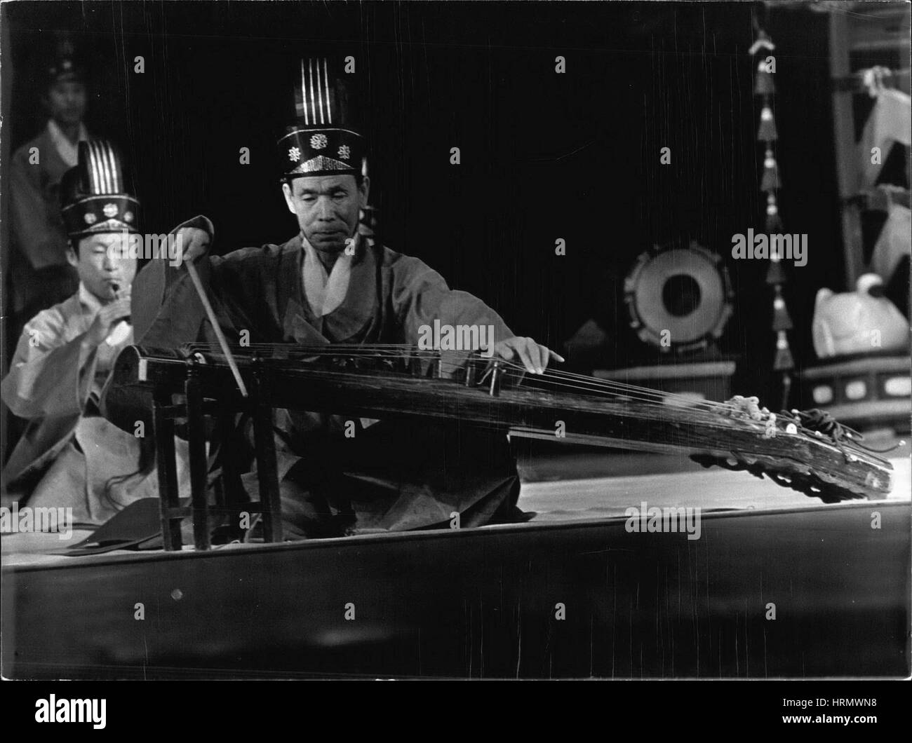Nov. 01, 1973 - Korean Musician Playing the Ajaeng at Champs-Elysee ...