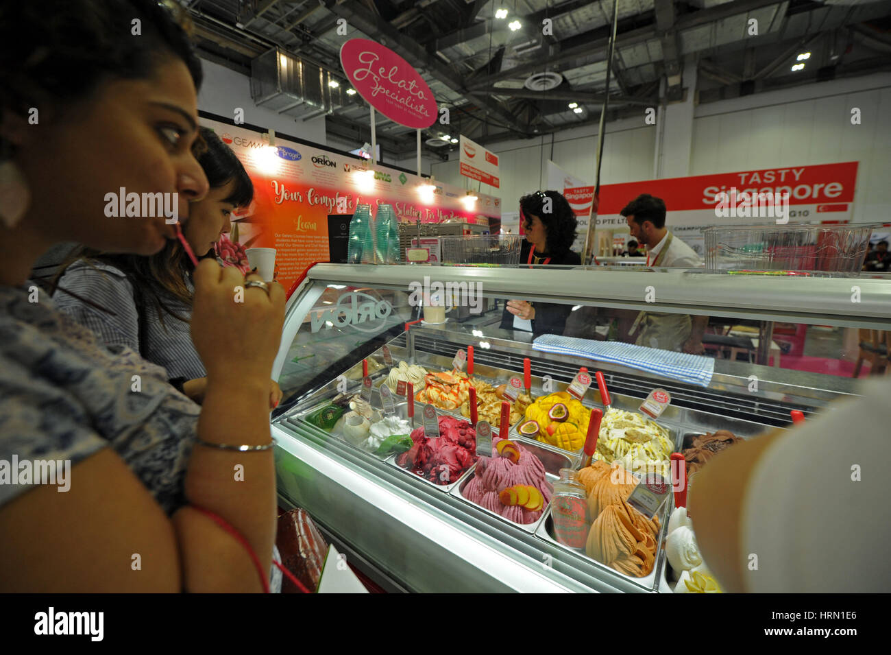 Singapore, Singapore. 3rd Mar, 2017. Visitors taste samples of gelato ...