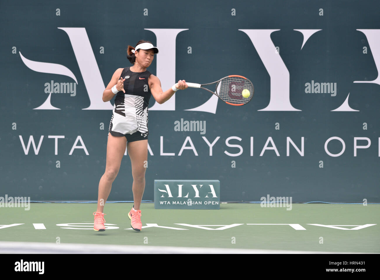 Kuala Lumpur, Malaysia. 3rd Mar, 2017. Xinyun Han of China return the ...