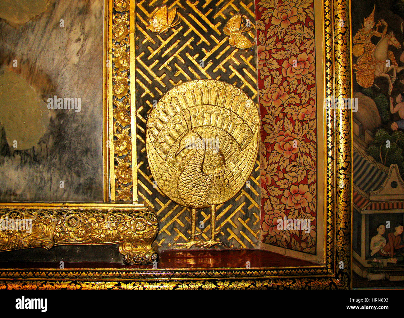 Photos bright Asian gold pattern with peacock Stock Photo - Alamy