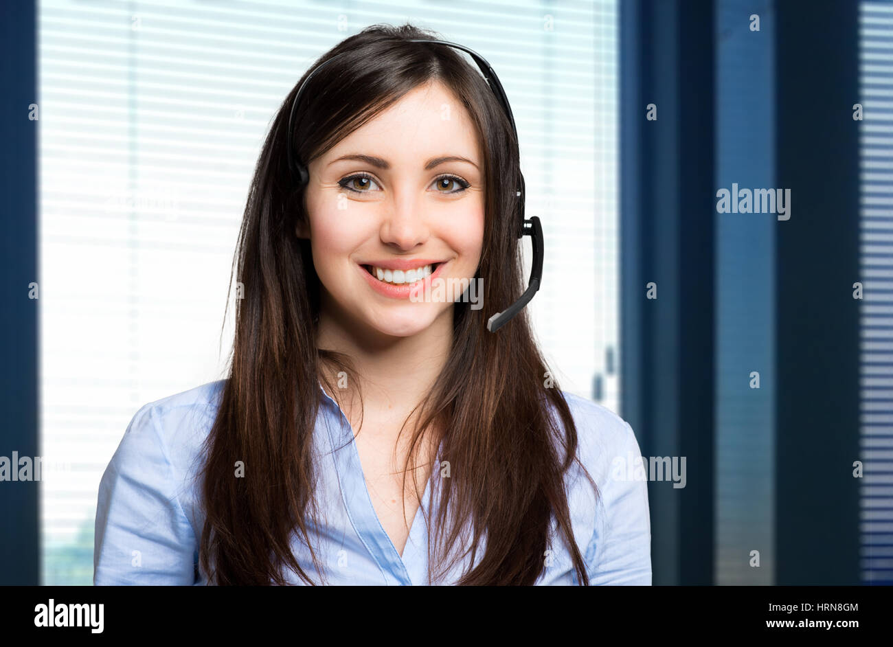 Portrait of a beautiful girl with headset Stock Photo - Alamy