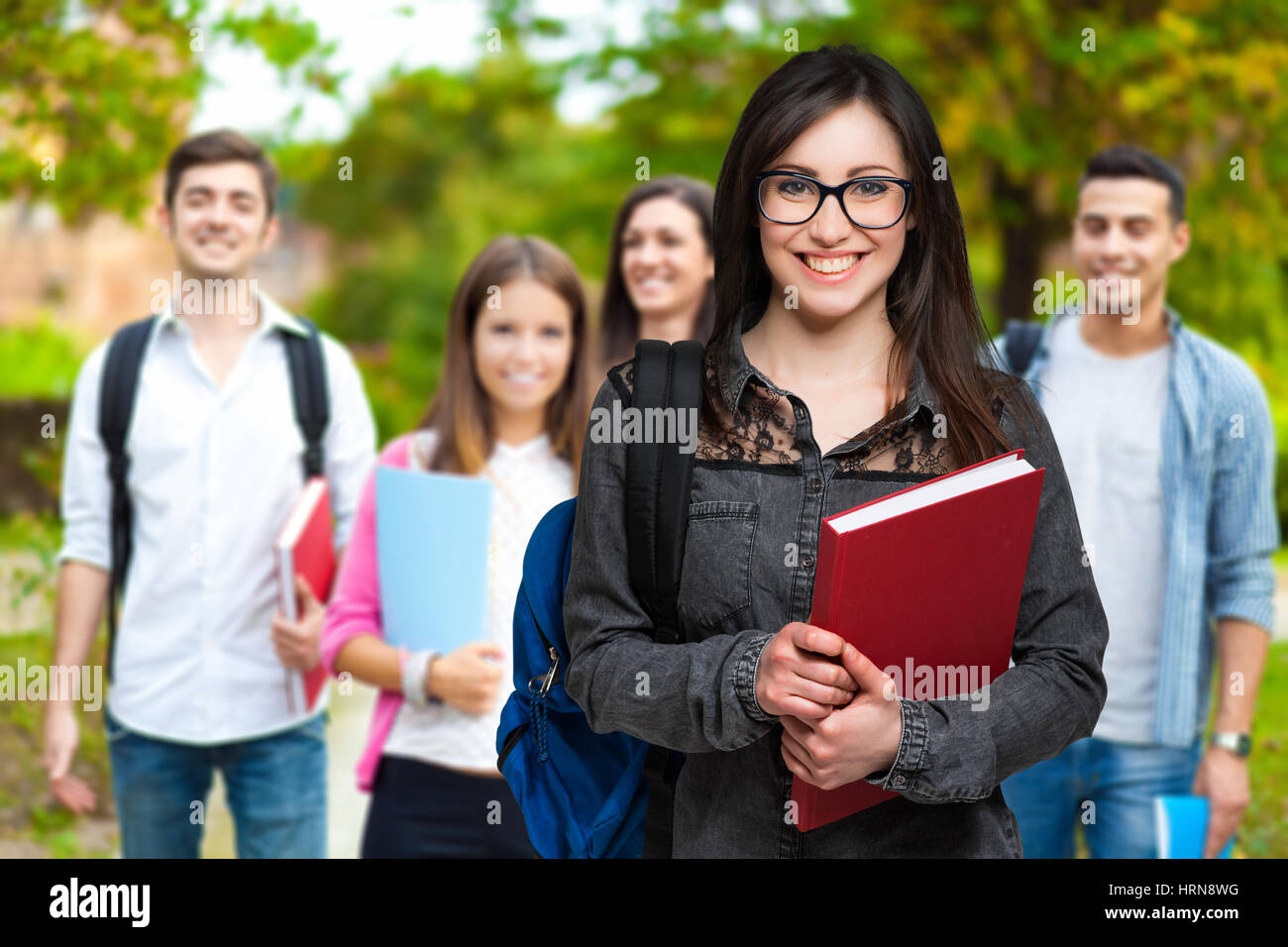 Students in a park Stock Photo - Alamy