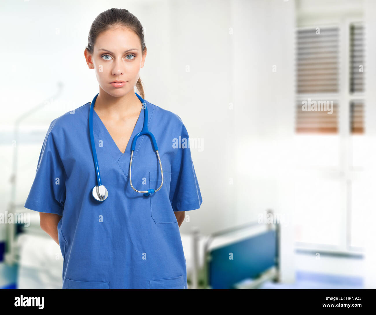 Portrait of a friendly female nurse Stock Photo - Alamy