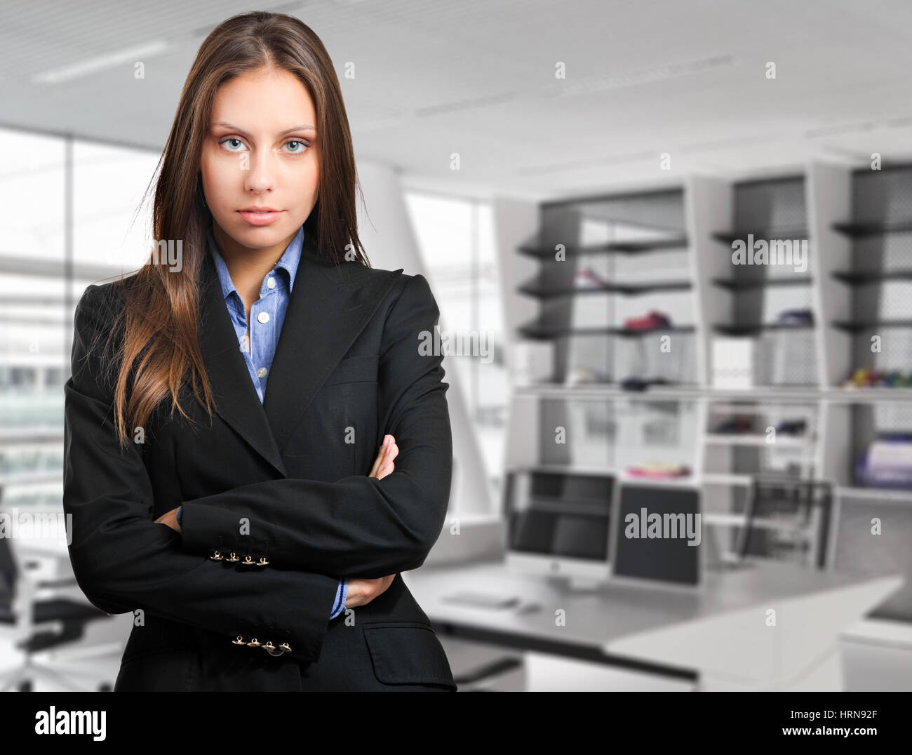 Beautiful young manager in her office Stock Photo - Alamy