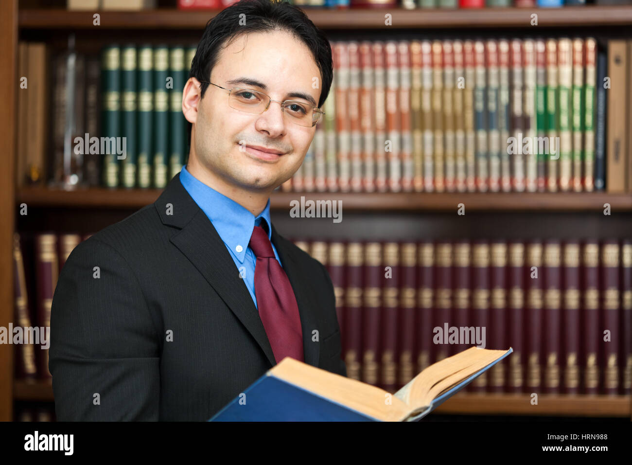 Successful lawyer portrait in his studio Stock Photo - Alamy