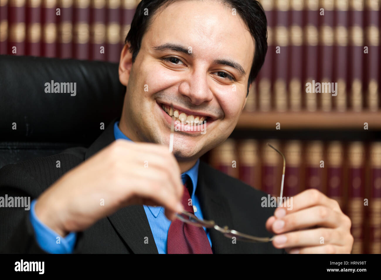 Successful lawyer portrait in his studio Stock Photo - Alamy