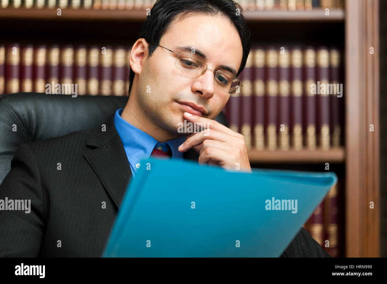 Successful lawyer portrait in his studio Stock Photo - Alamy