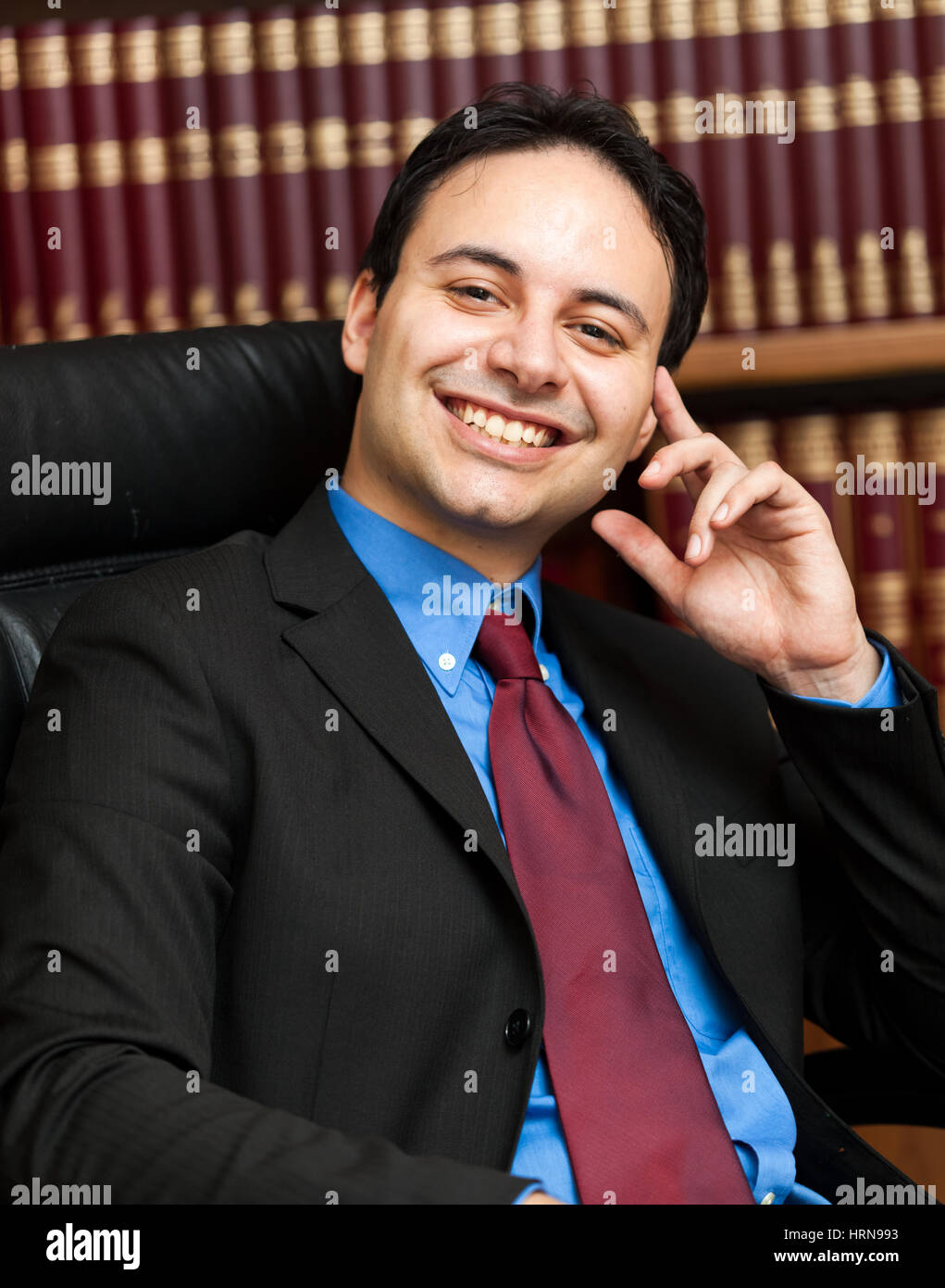 Successful lawyer portrait in his studio Stock Photo - Alamy