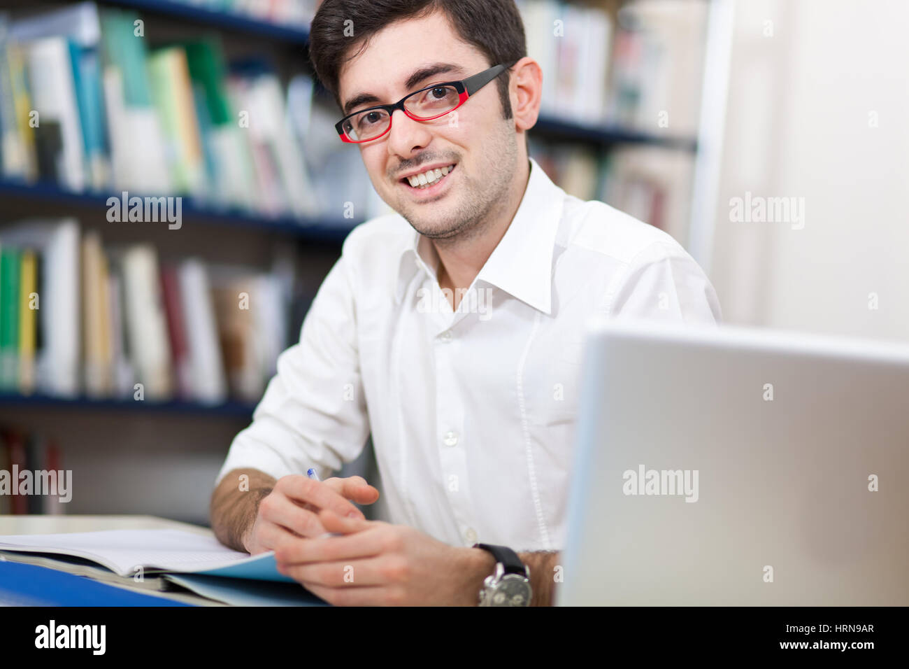 Portrait of a Student in a Library Stock Photo - Alamy