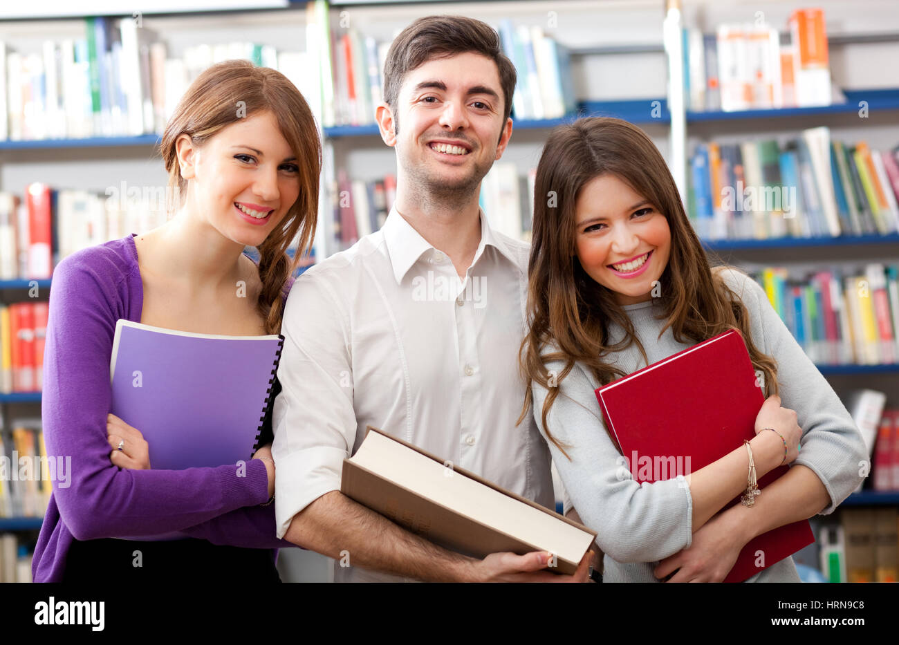 Group of Students at work in a Library Stock Photo - Alamy
