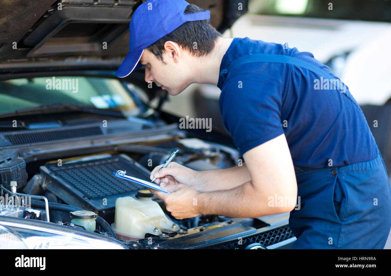 Car mechanic at work Stock Photo - Alamy