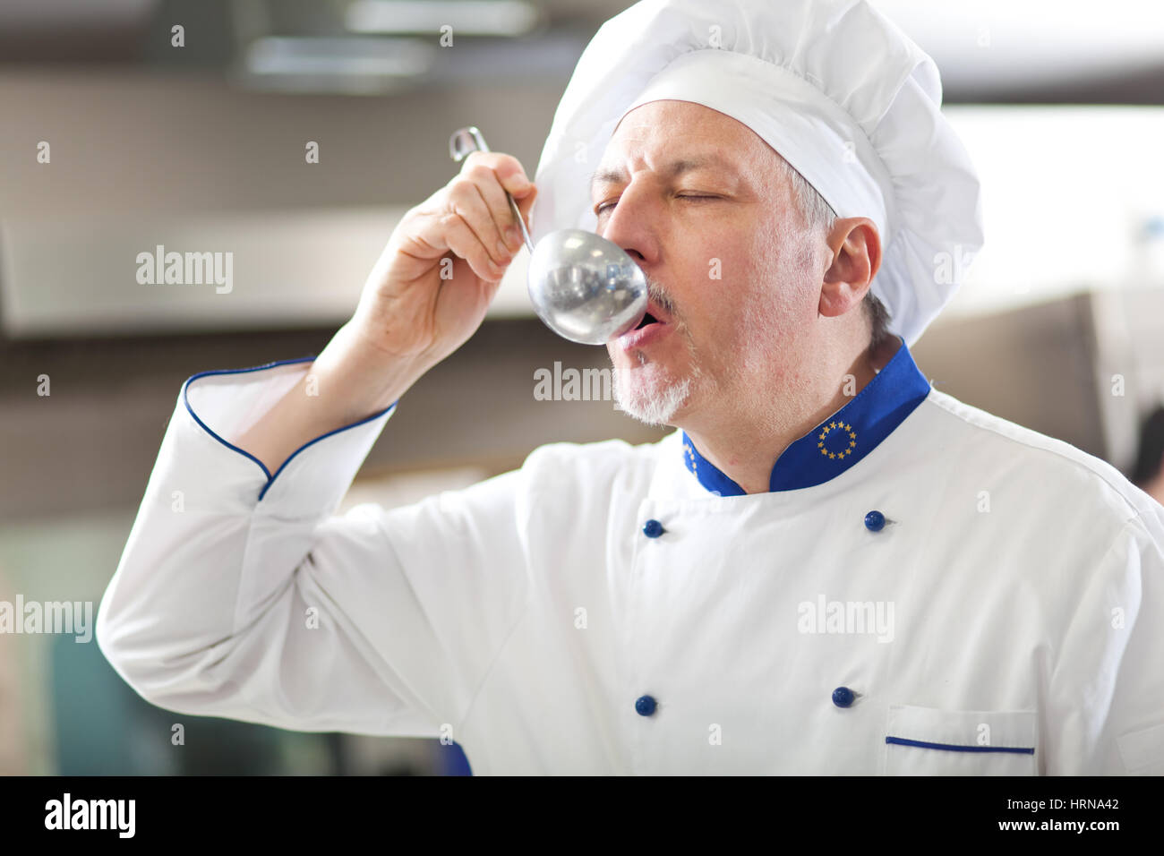 Detail of a Chef at work in his Kitchen Stock Photo - Alamy
