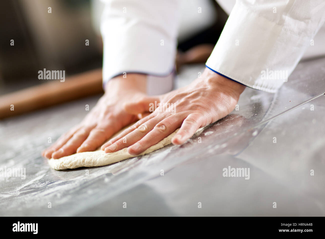 Detail of a Chef at work in his Kitchen Stock Photo - Alamy