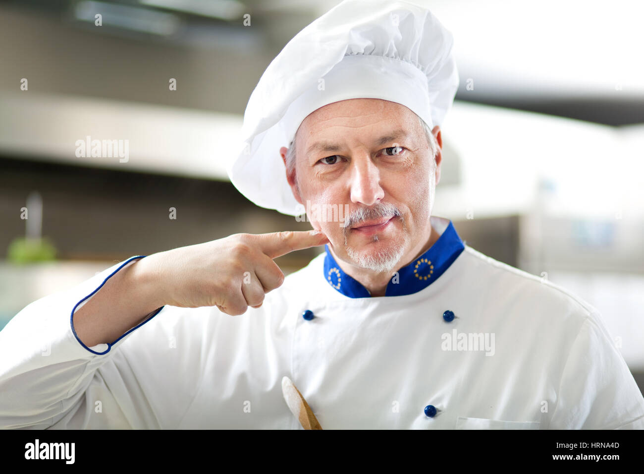 Portrait of a Chef at work in his Kitchen Stock Photo - Alamy