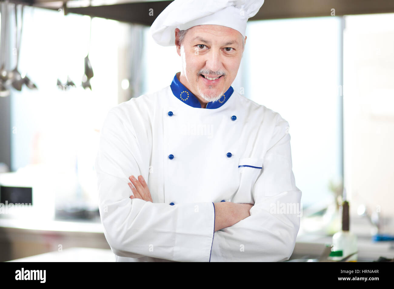 Portrait of a Chef at work in his Kitchen Stock Photo - Alamy