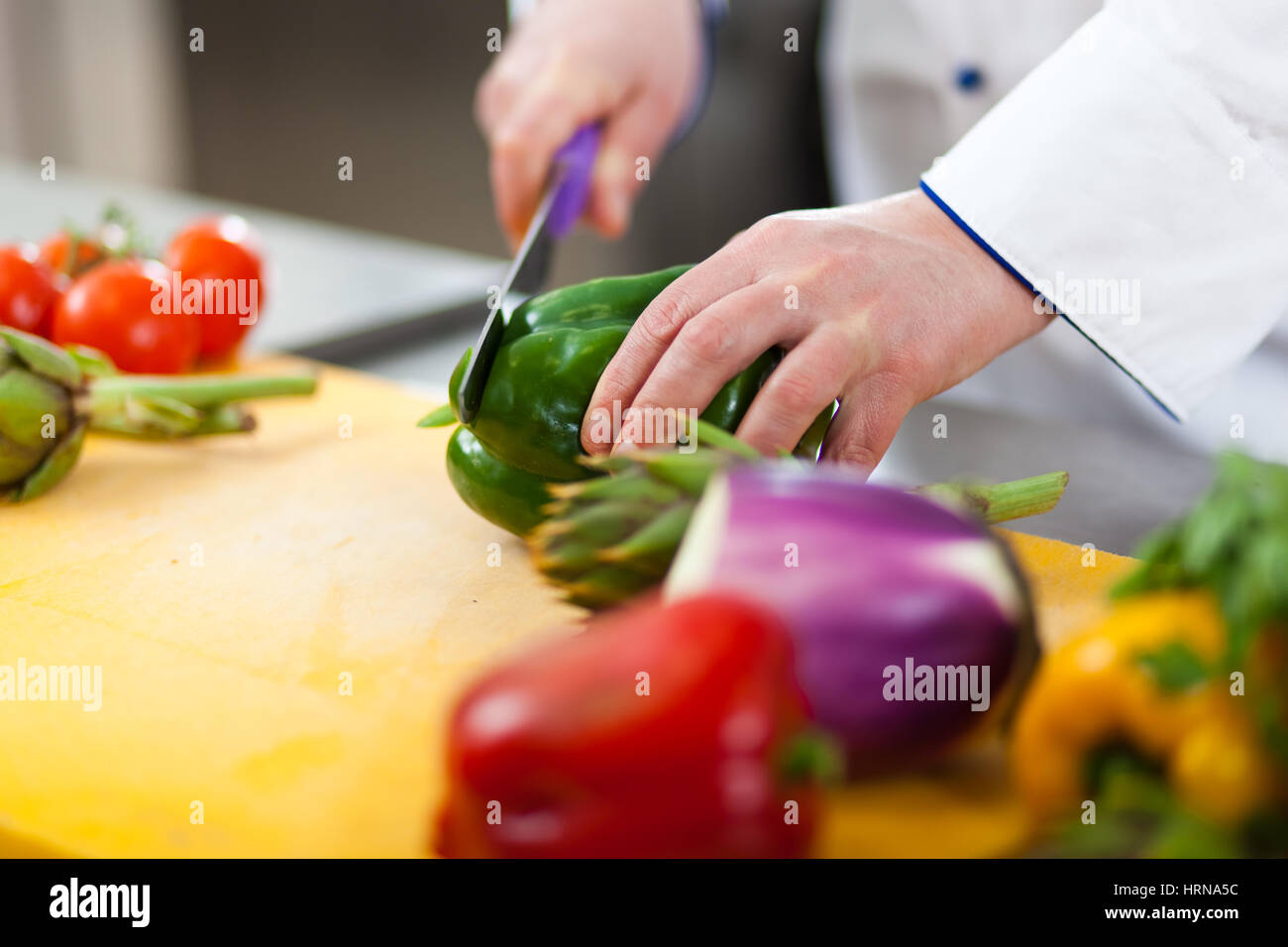Detail of a Chef at work in his Kitchen Stock Photo - Alamy