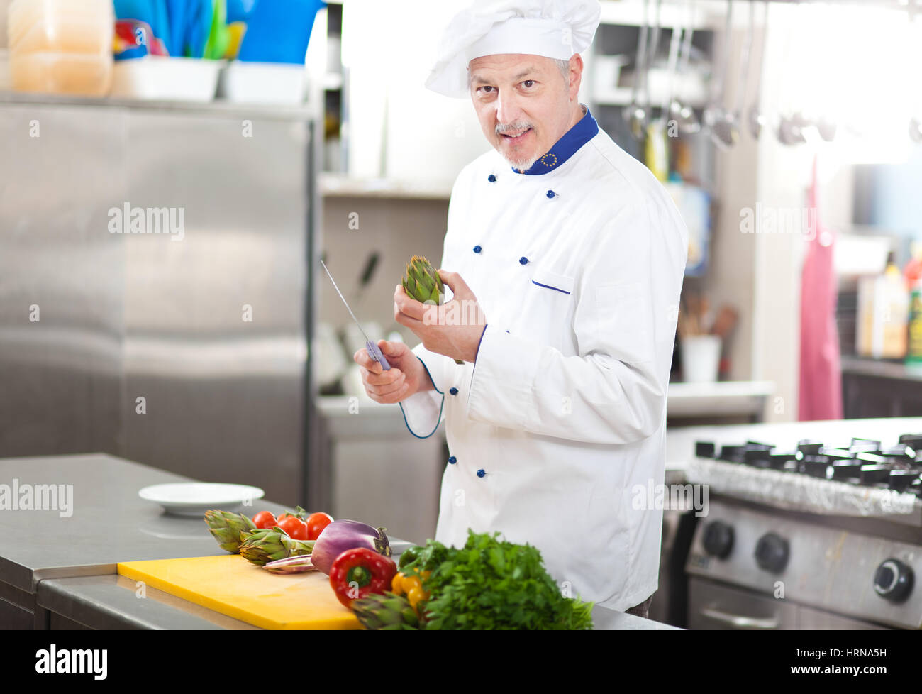 Portrait of a Chef at work in his Kitchen Stock Photo - Alamy