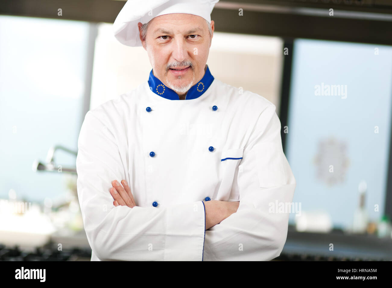 Portrait of a Chef at work in his Kitchen Stock Photo - Alamy