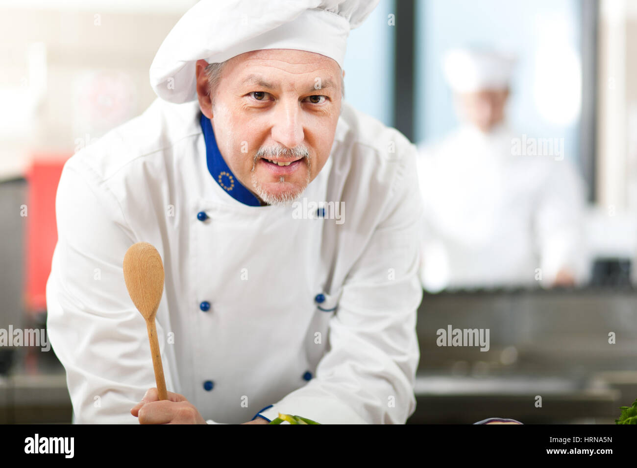 Portrait of a Chef at work in his Kitchen Stock Photo - Alamy