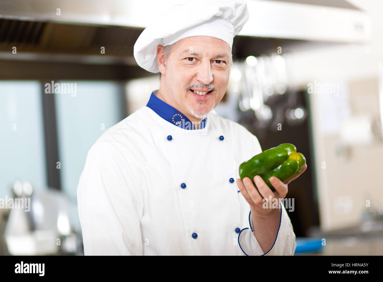 Portrait of a Chef at work in his Kitchen Stock Photo - Alamy