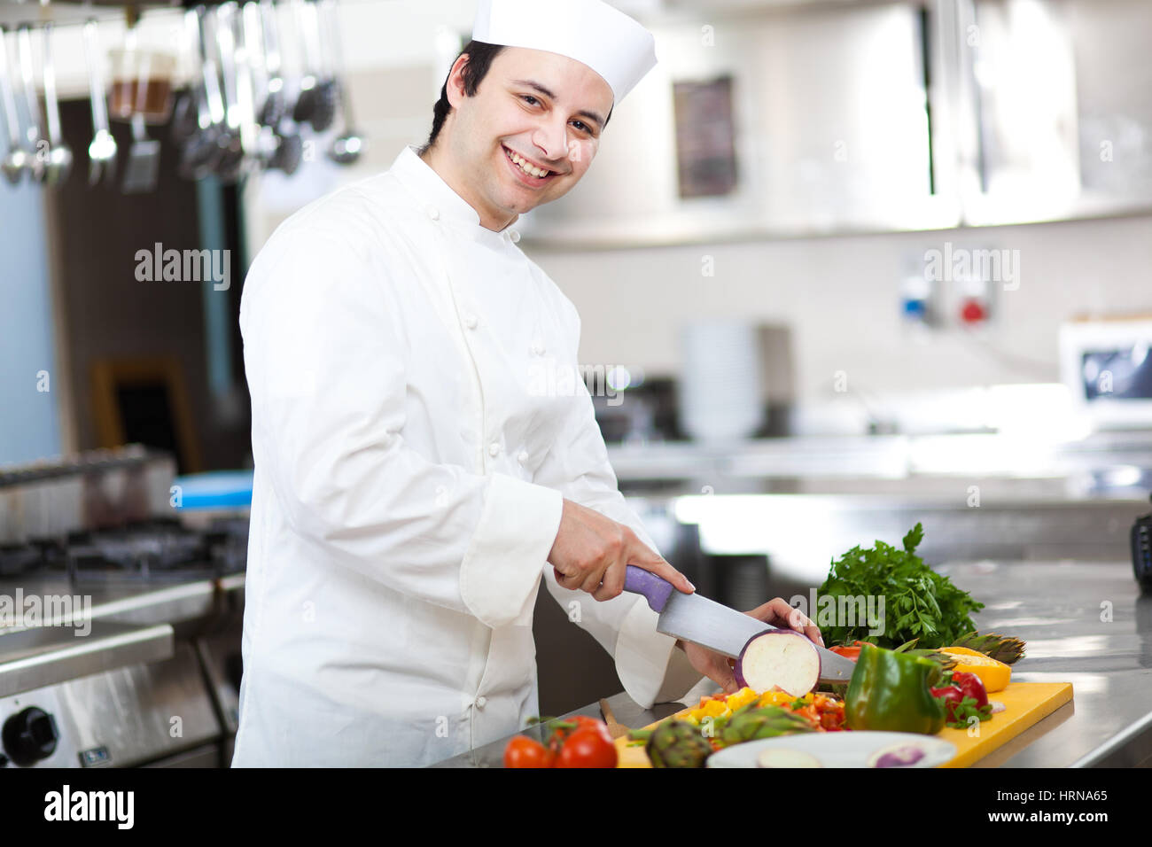 Portrait of a Chef at work in his Kitchen Stock Photo - Alamy