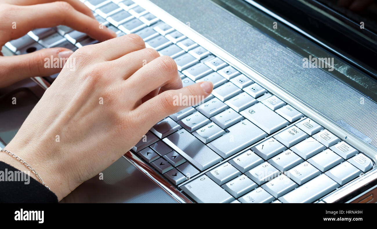 Woman fingers pressing keyboard laptop hi-res stock photography and ...