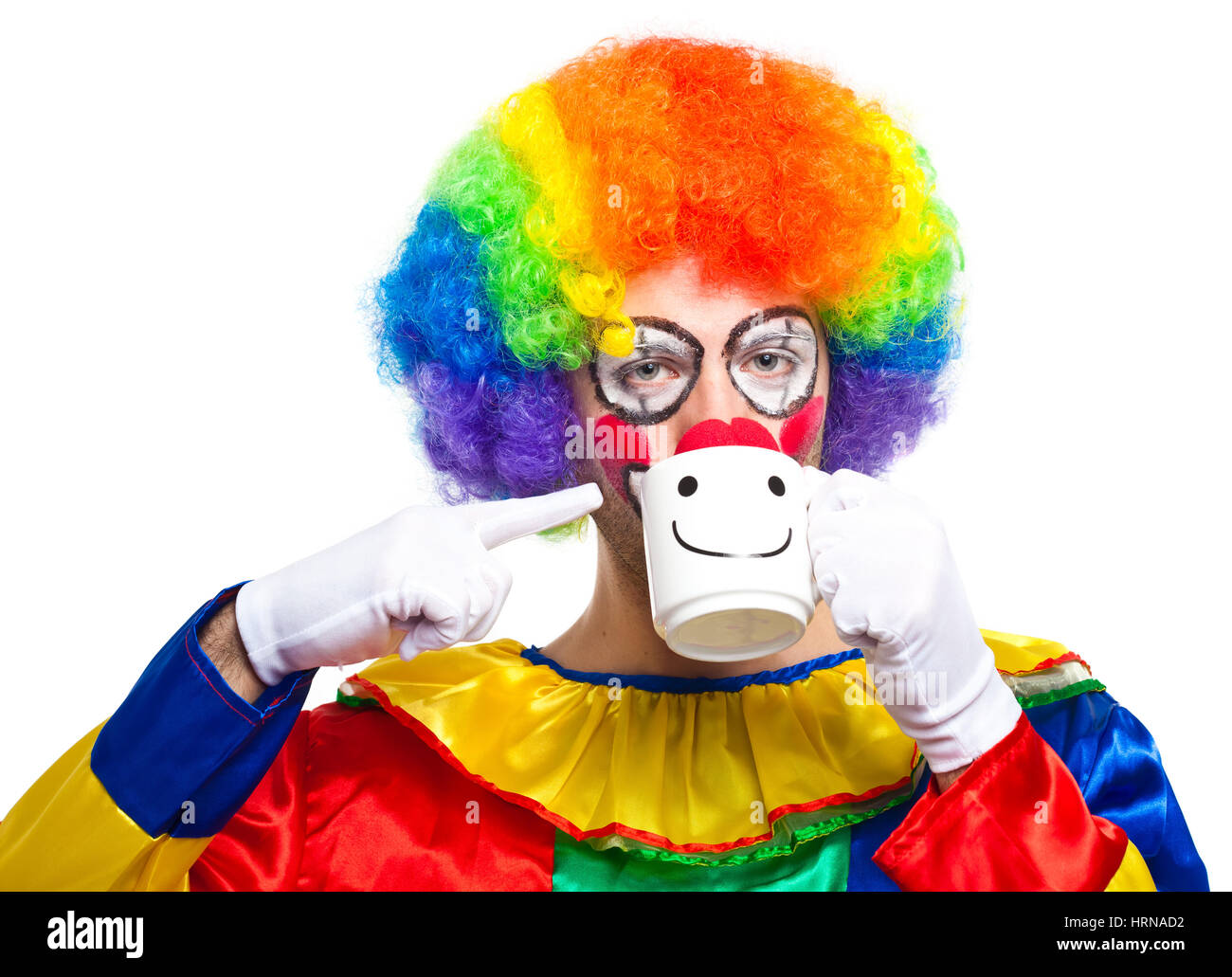 Clown drinking from a cup Stock Photo - Alamy