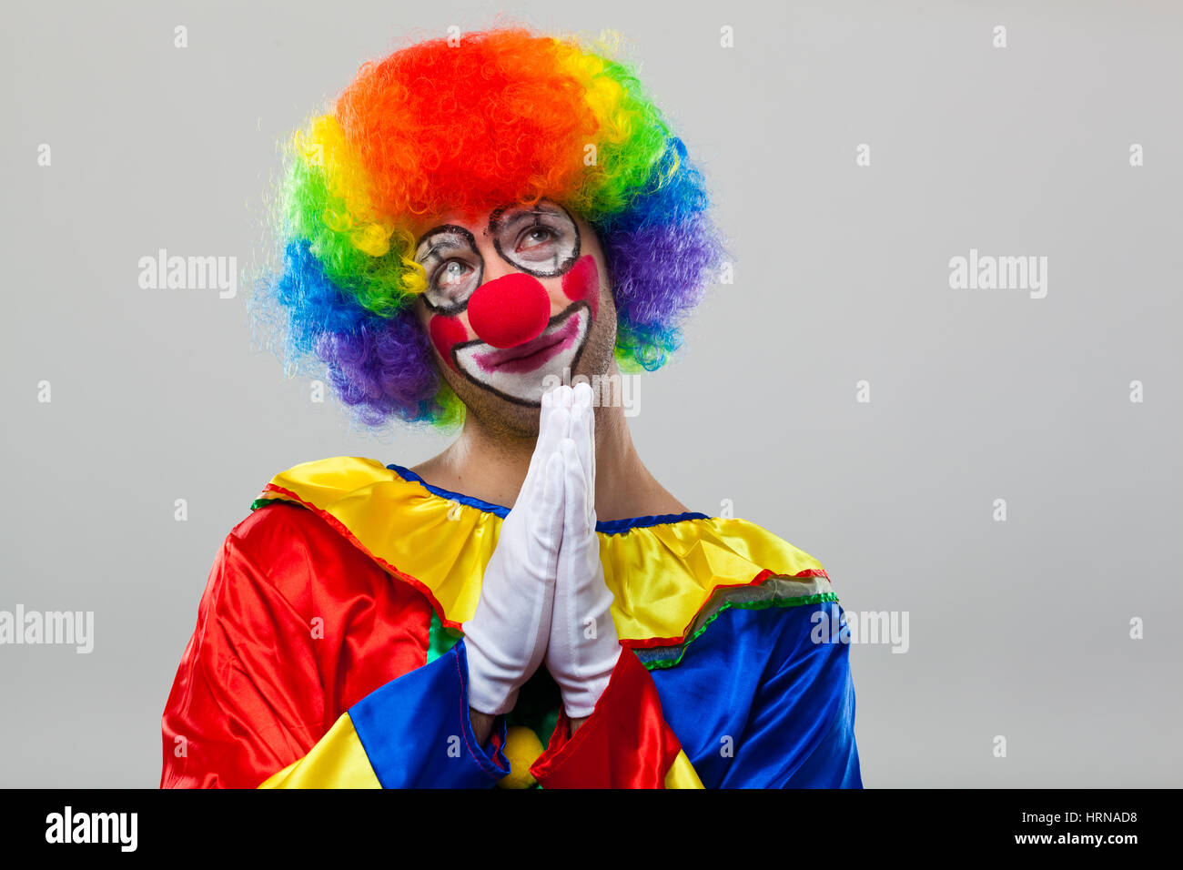 Praying clown hi-res stock photography and images - Alamy