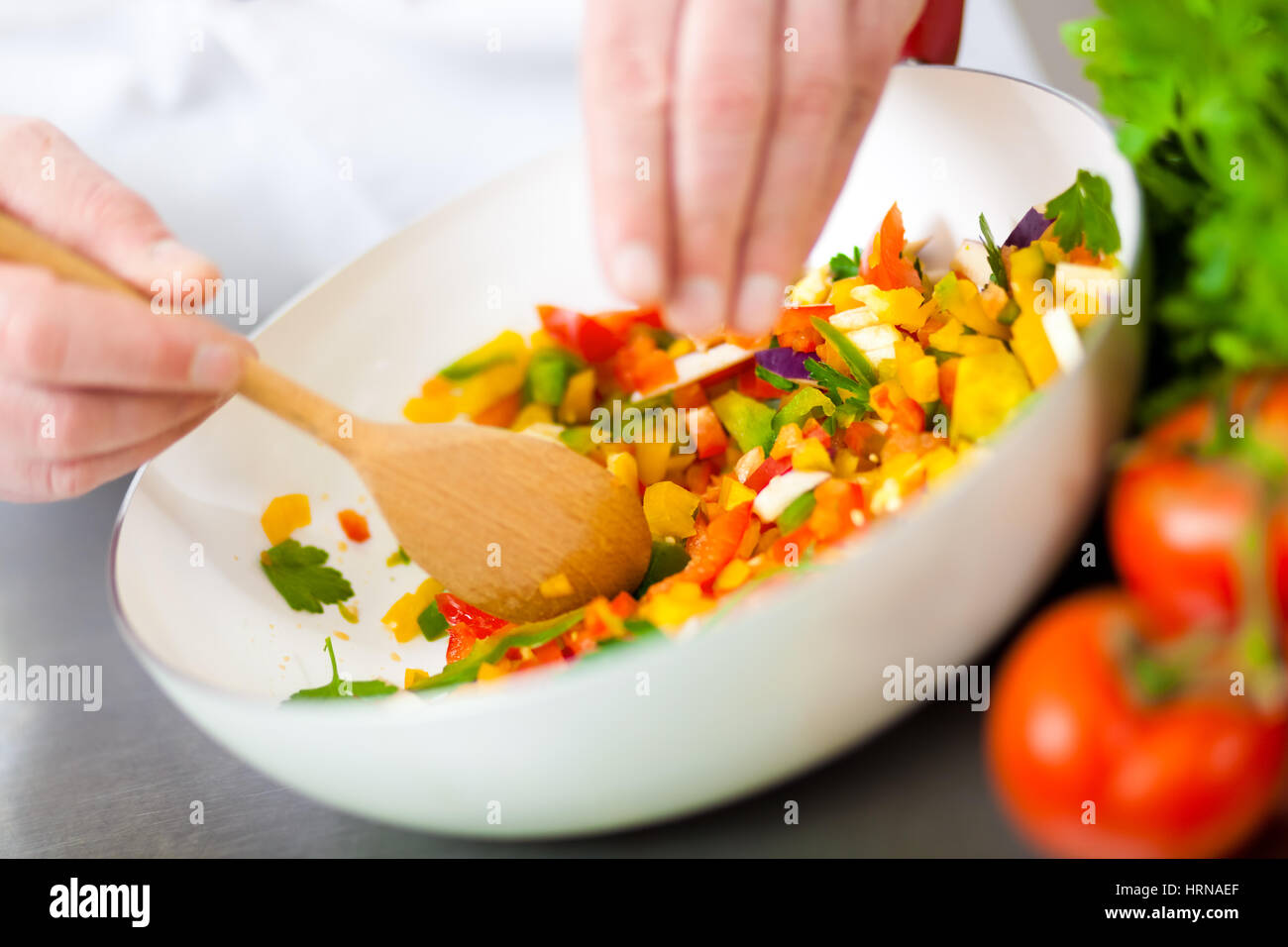 Detail of a Chef at work in his Kitchen Stock Photo - Alamy