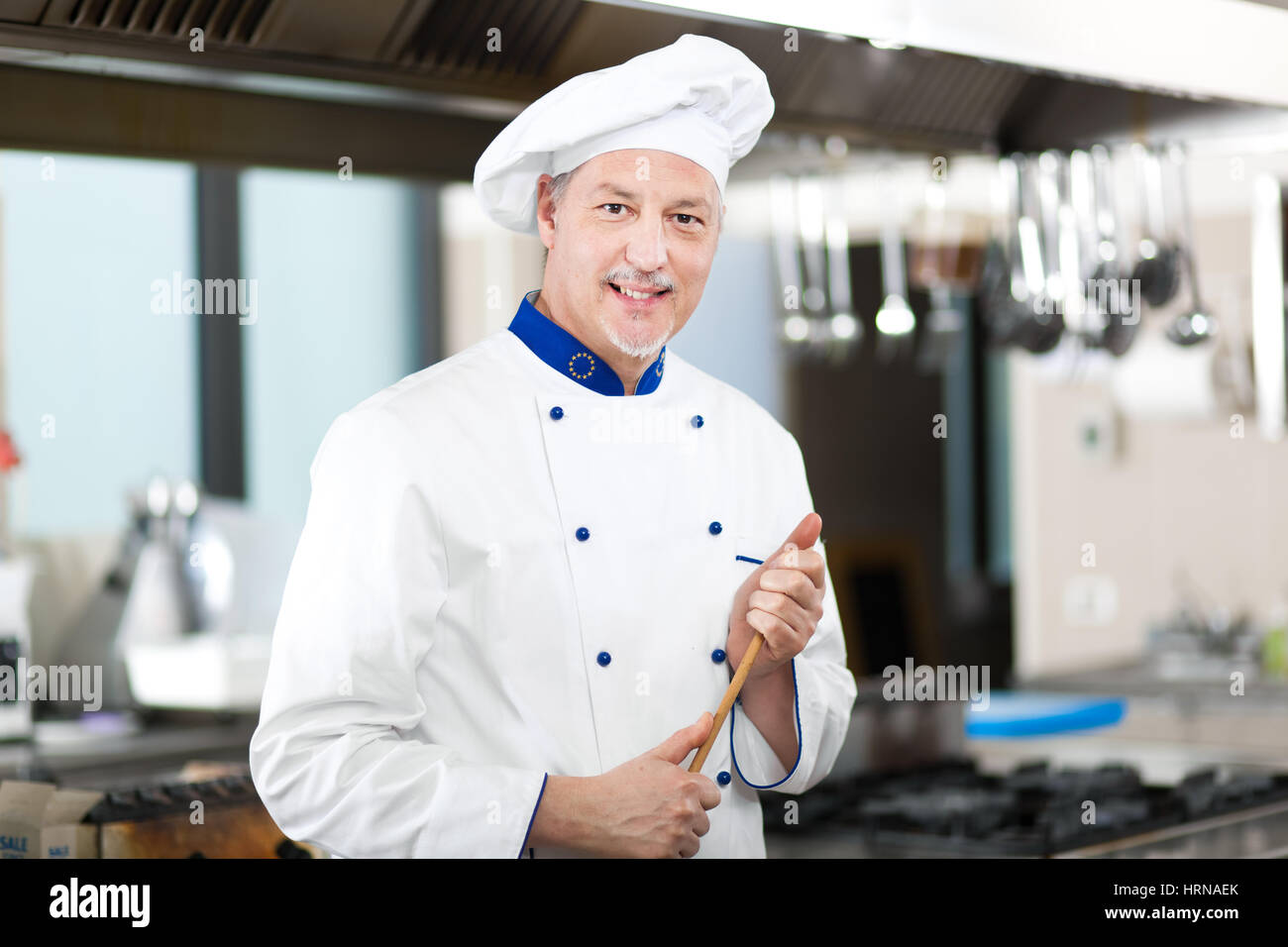 Portrait of a Chef at work in his Kitchen Stock Photo - Alamy