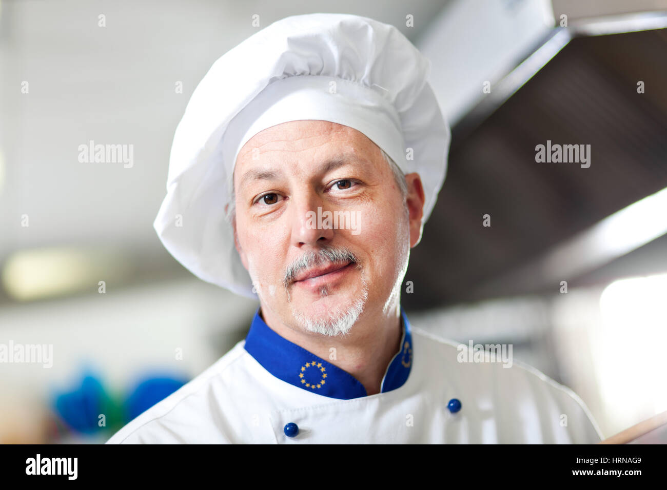 Portrait of a Chef at work in his Kitchen Stock Photo - Alamy