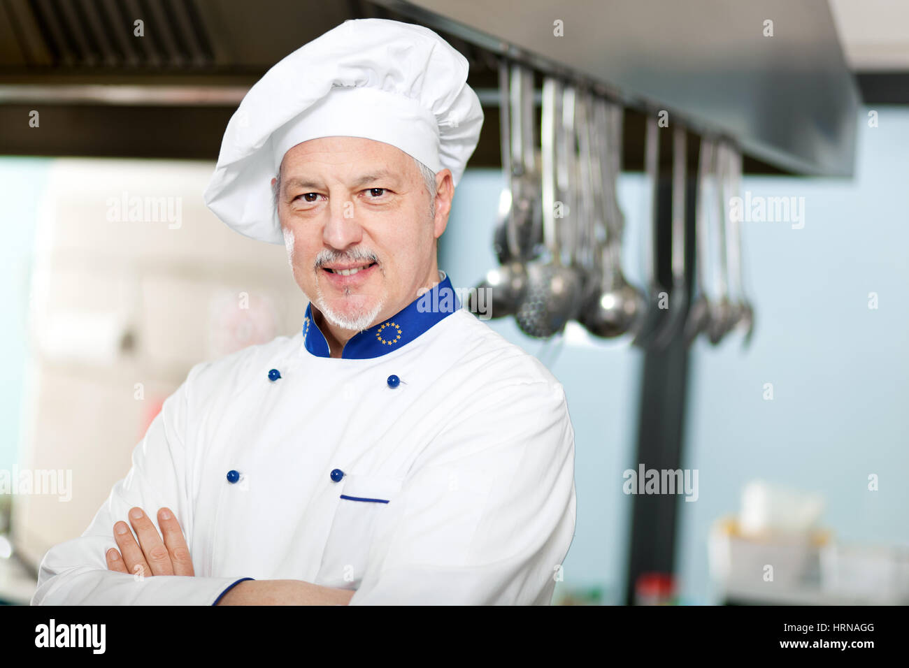 Portrait of a Chef at work in his Kitchen Stock Photo - Alamy
