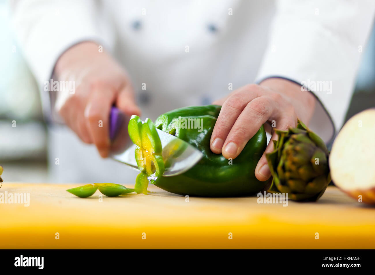 Detail of a Chef at work in his Kitchen Stock Photo - Alamy