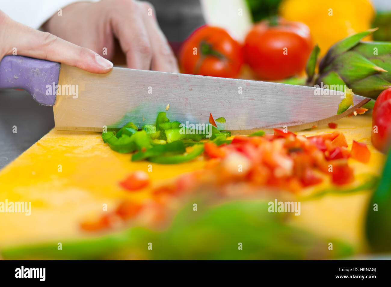 Detail of a Chef at work in his Kitchen Stock Photo - Alamy