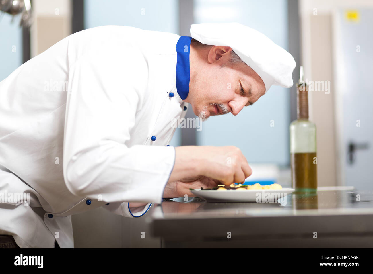Portrait of a Chef at work in his Kitchen Stock Photo - Alamy