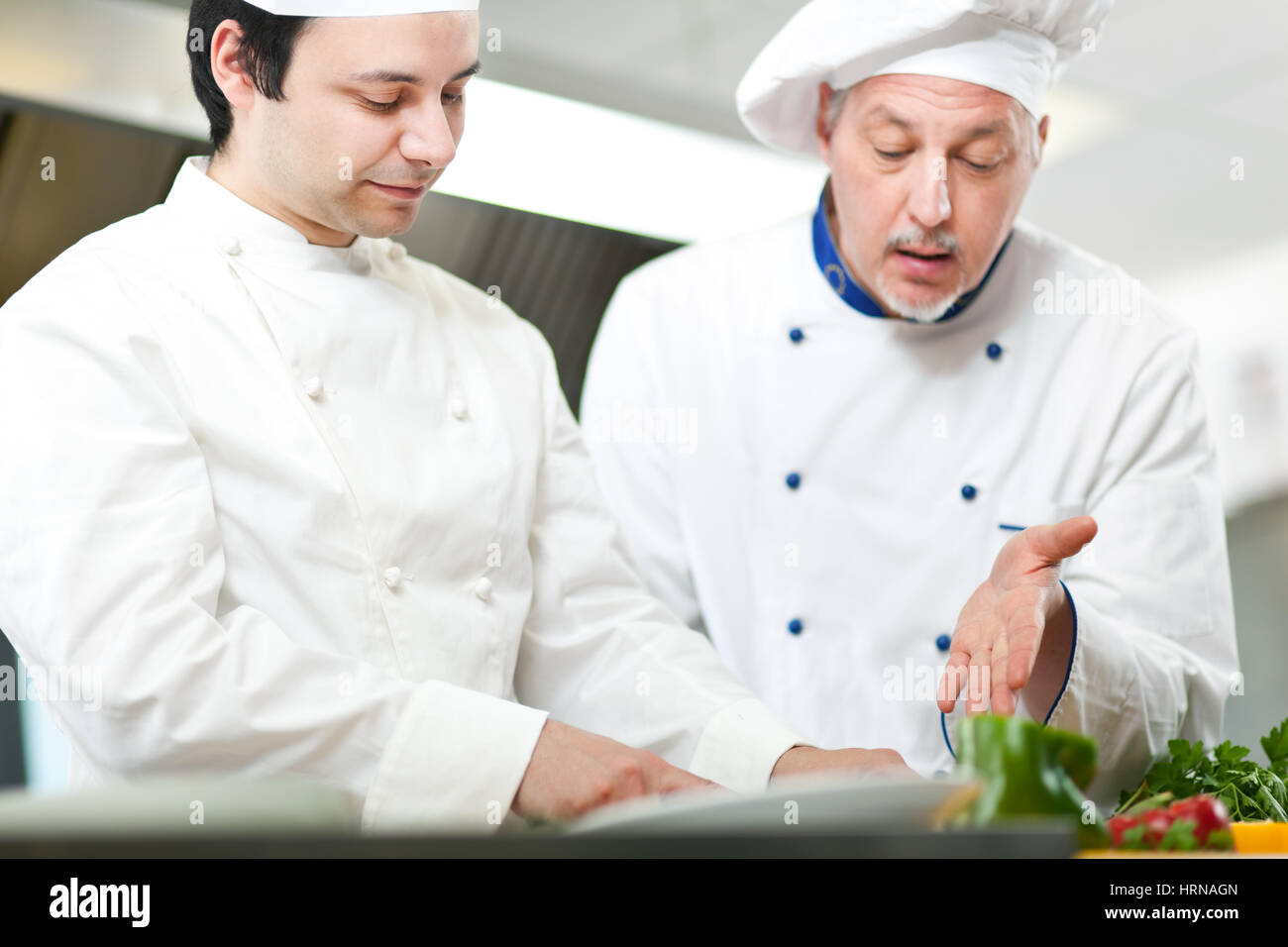 Detail of a Chef at work in his Kitchen Stock Photo - Alamy