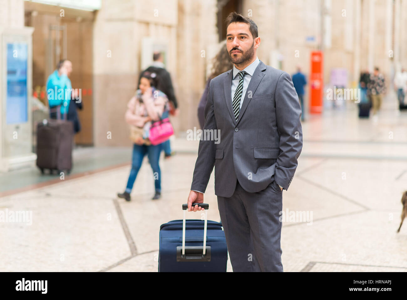 Traveler pushing his trolley Stock Photo - Alamy