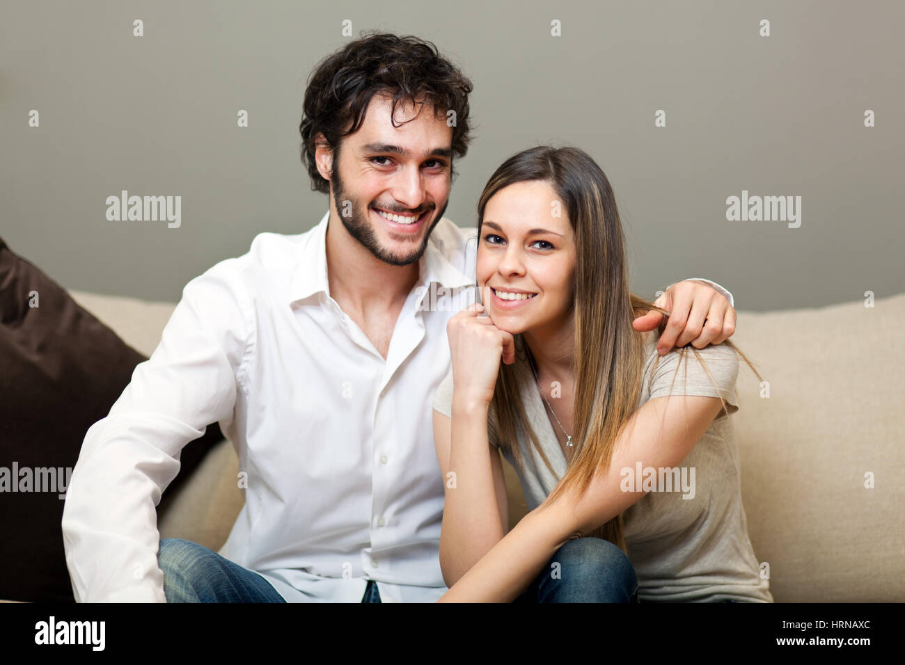 Happy young couple in their house Stock Photo - Alamy