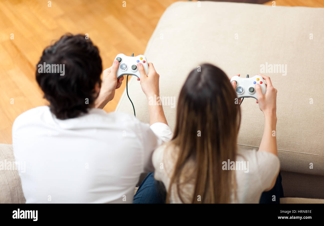 Man playing video games sad woman hi-res stock photography and images ...