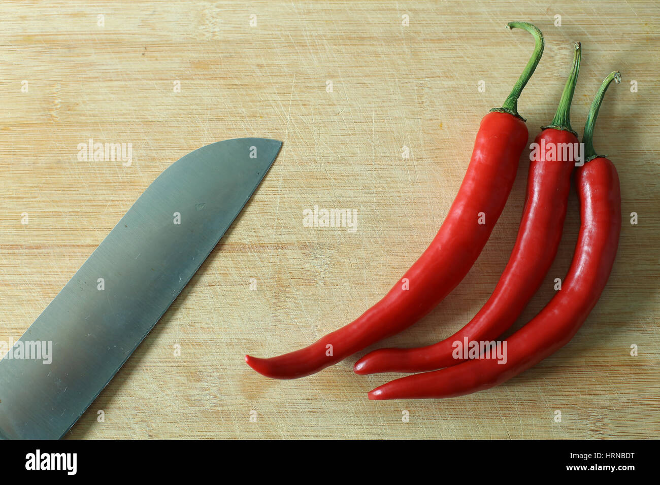 Chilli and knife on wooden background,top view,place for text Stock ...