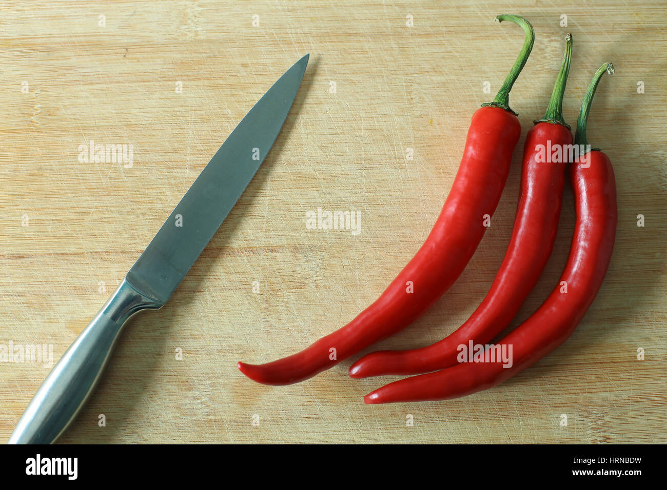 Chilli and knife on wooden background,top view,place for text Stock ...