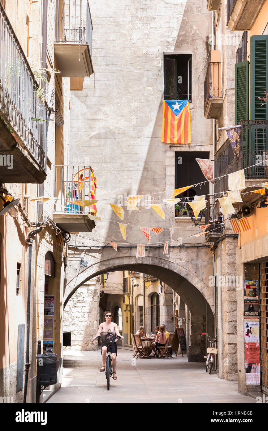 Girl on moped, barri vell old quarter, Girona, Spain Stock Photo - Alamy