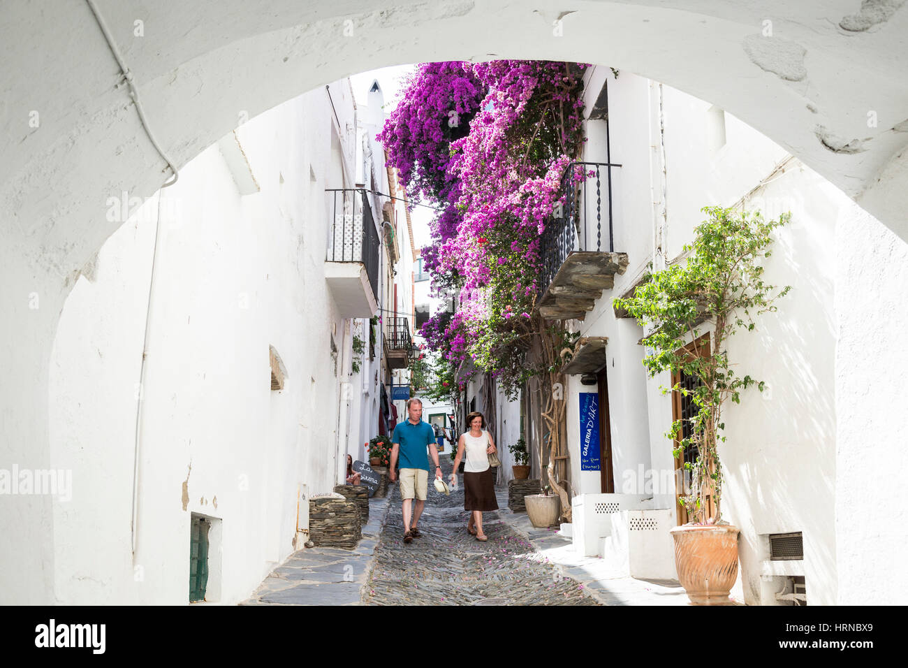 Exploring the narrow whitewashed streets of Cadaques, Costa Brava ...