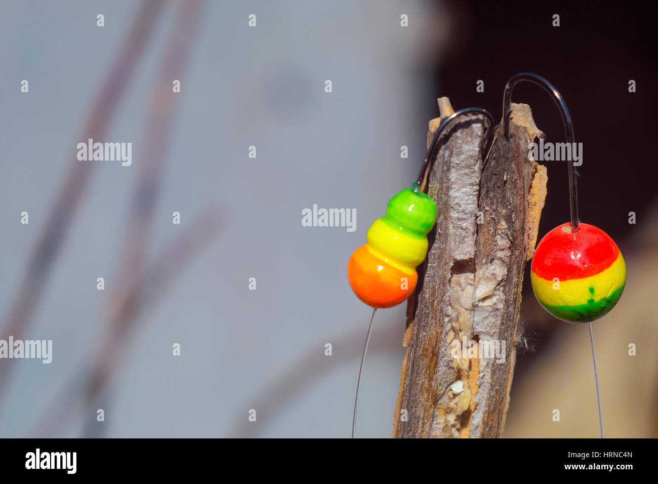 two float with a hook for fishing Stock Photo - Alamy