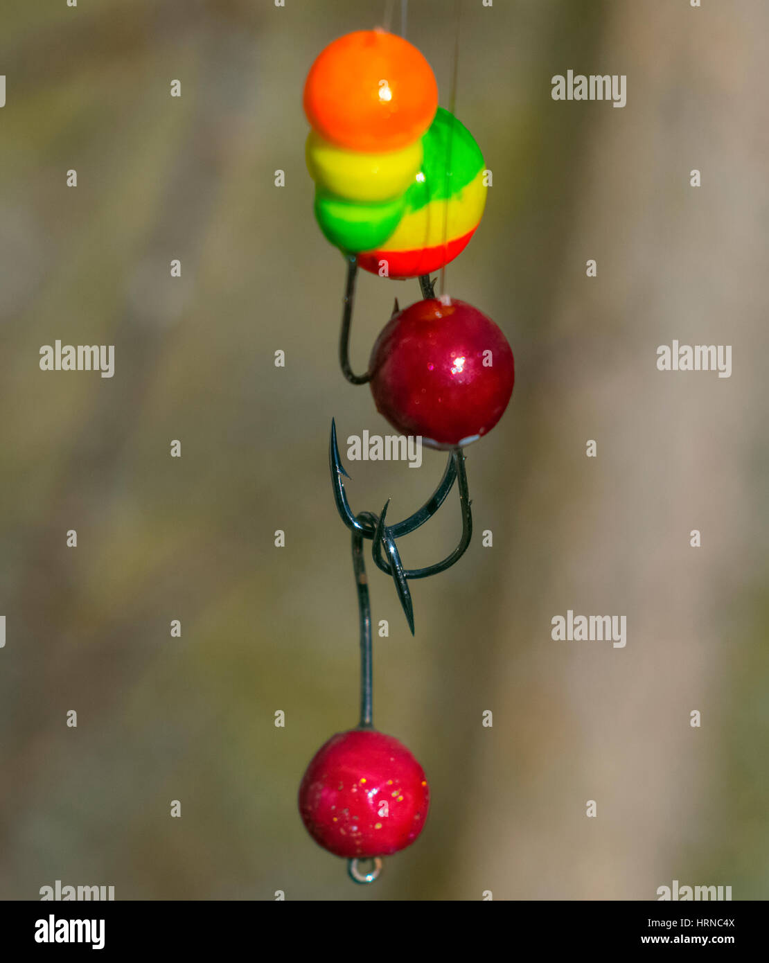 Four colorful floats with the hooks for fishing close-up Stock Photo ...
