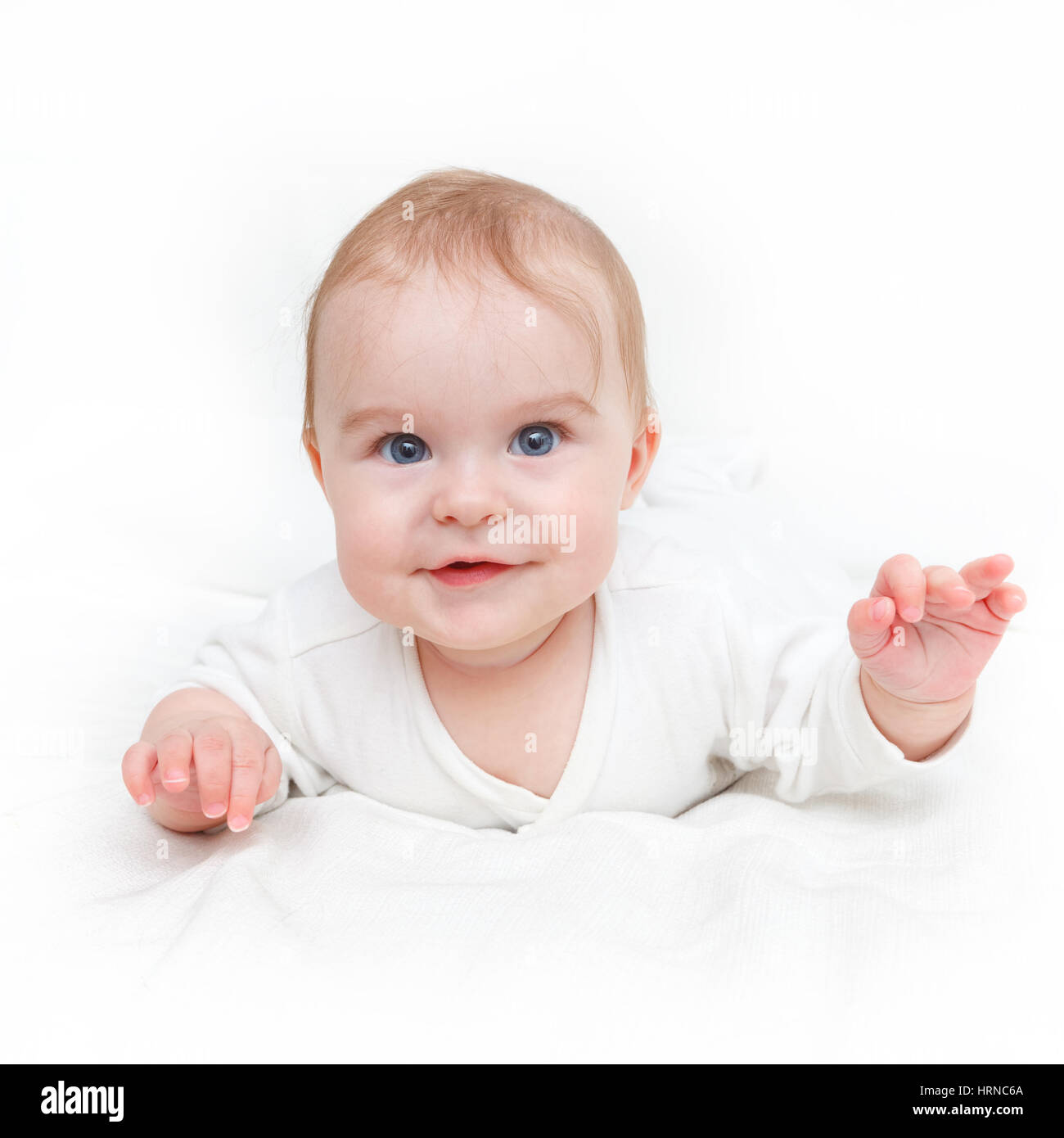 Crawling baby on white background Stock Photo - Alamy