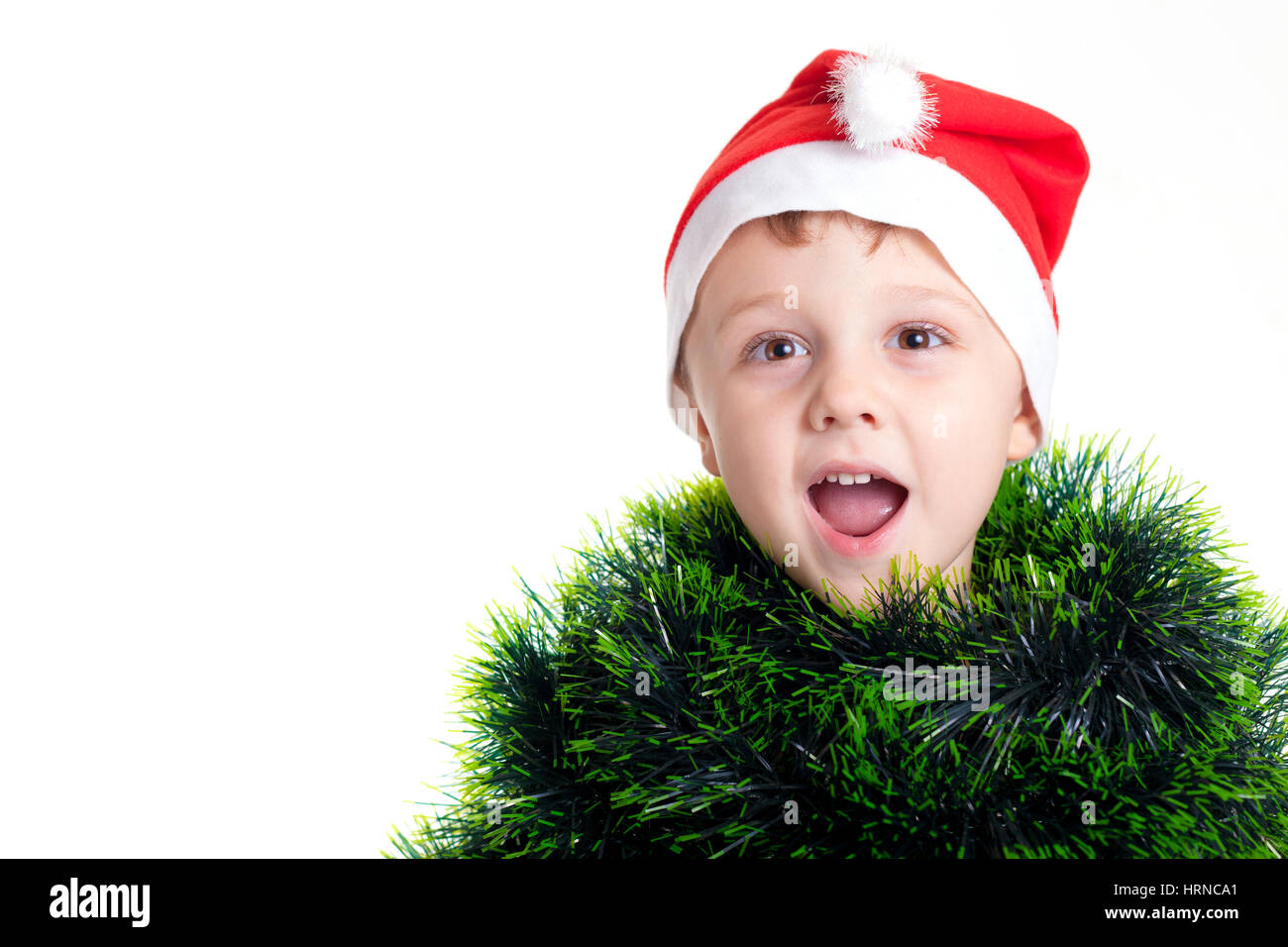 Happy little smiling boy with christmas hat. Concept of happy merry ...