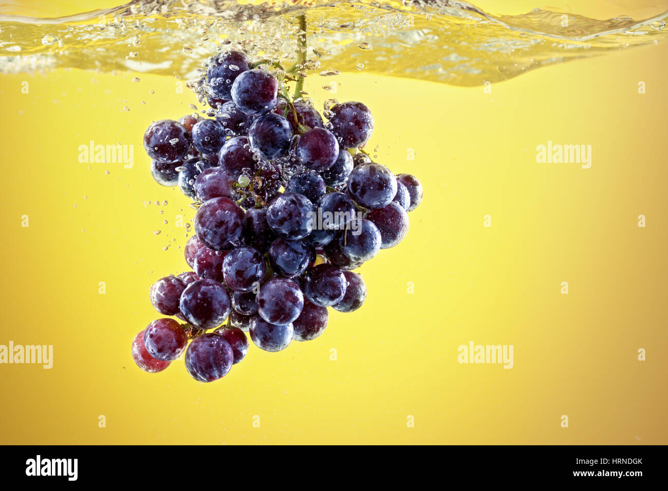 grapes and water splash background Stock Photo - Alamy